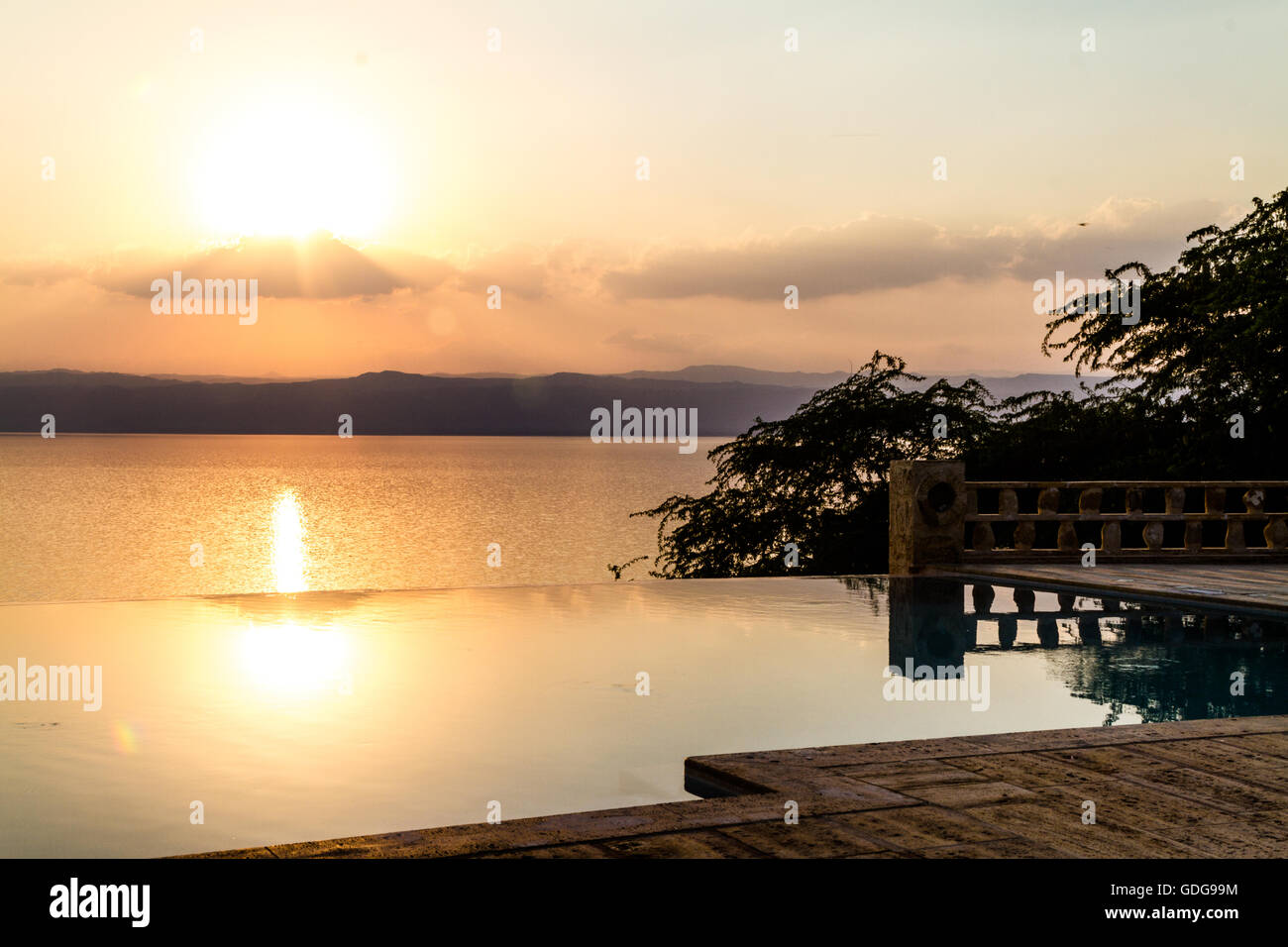Sunset at Dead Sea from Infinity Pool in Hotel Stock Photo - Alamy