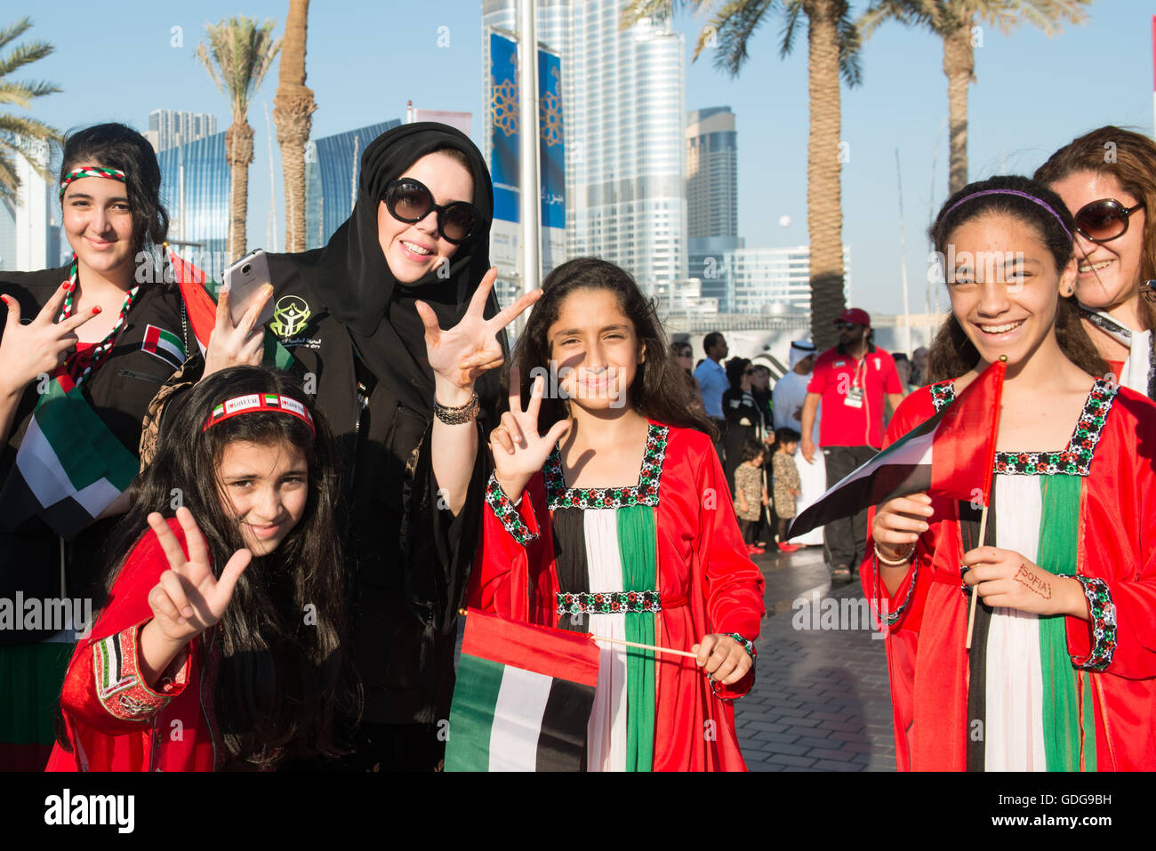 Emirati ladies during UAE National day Parade in Dubai showing the EXPO ...