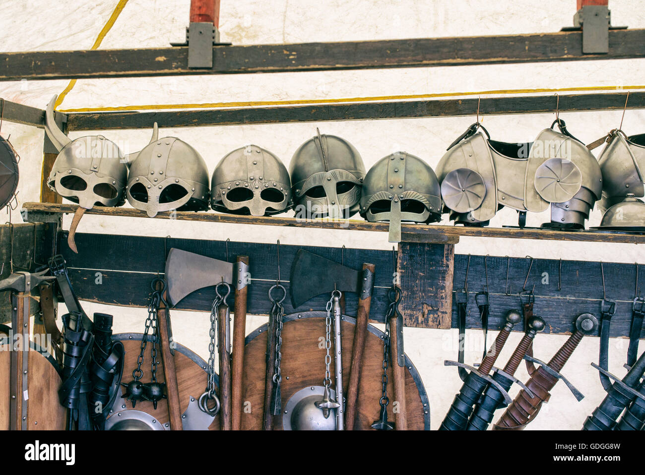 Medieval knights helmets and weapons in a tent at Tewkesbury medieval ...