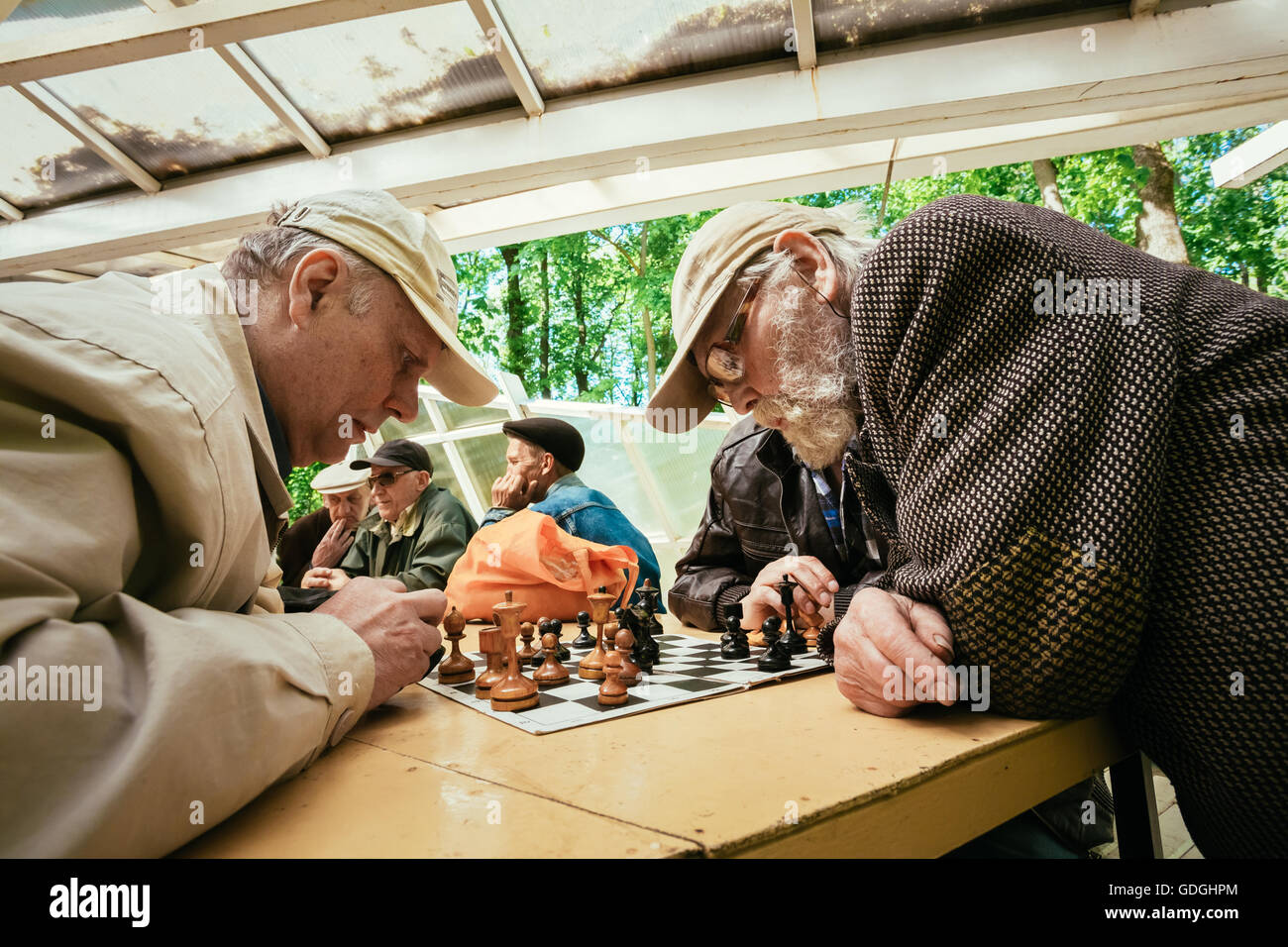 Old man playing chess hi-res stock photography and images - Alamy