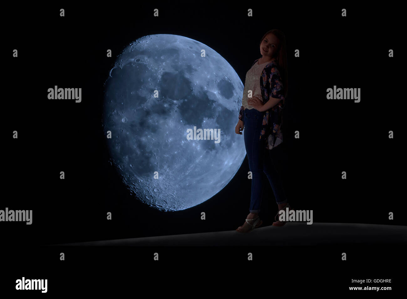 Model and Three Quarter moon composite Stock Photo - Alamy