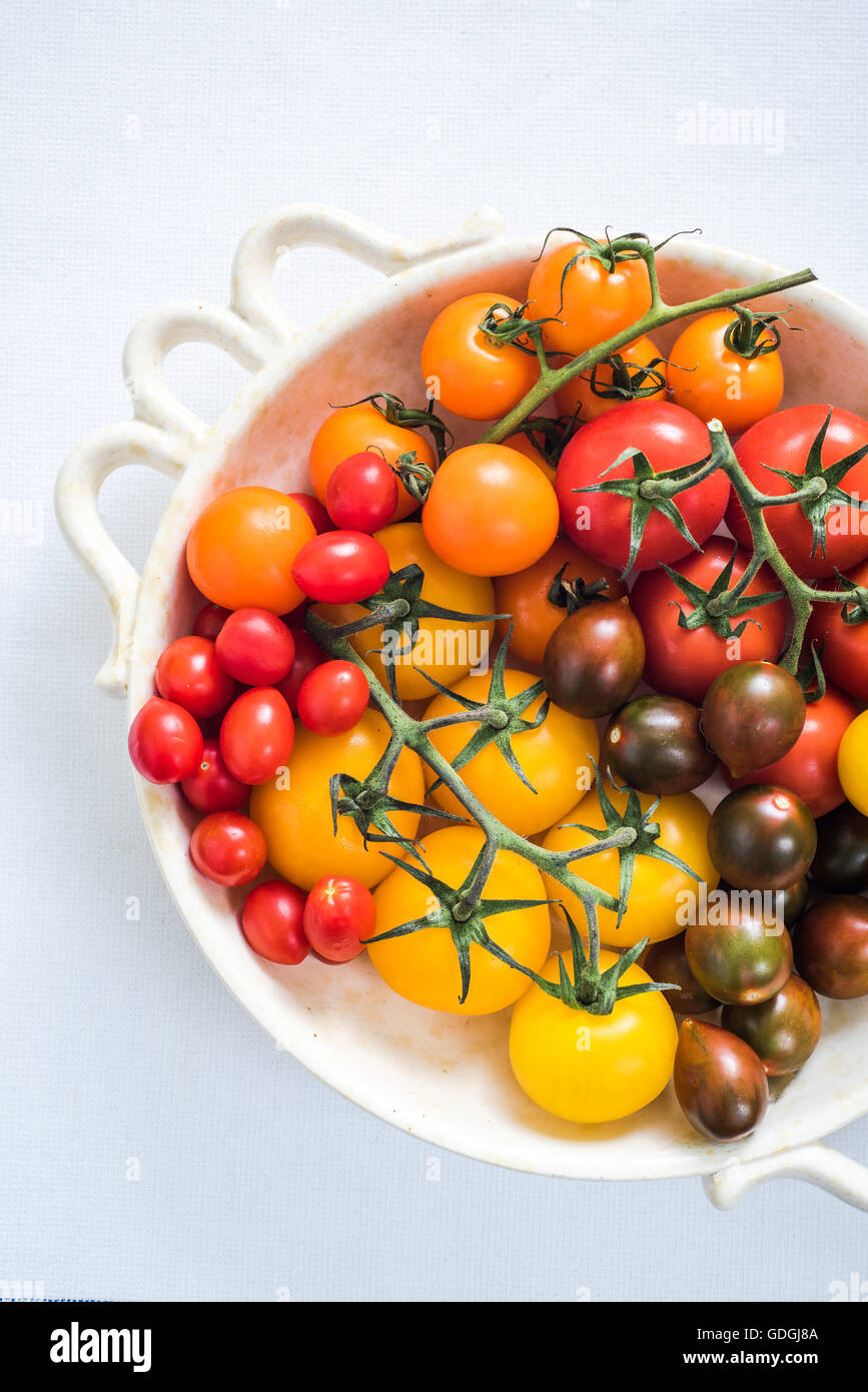 bowl with fresh assorted tomatoes, overhead view Stock Photo - Alamy