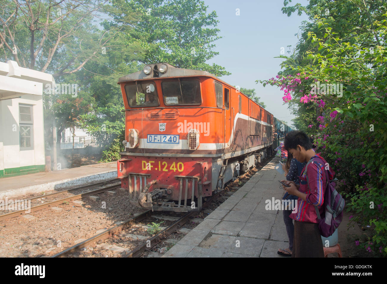 a train of the Yangon circle train in a trainstation near the City of ...