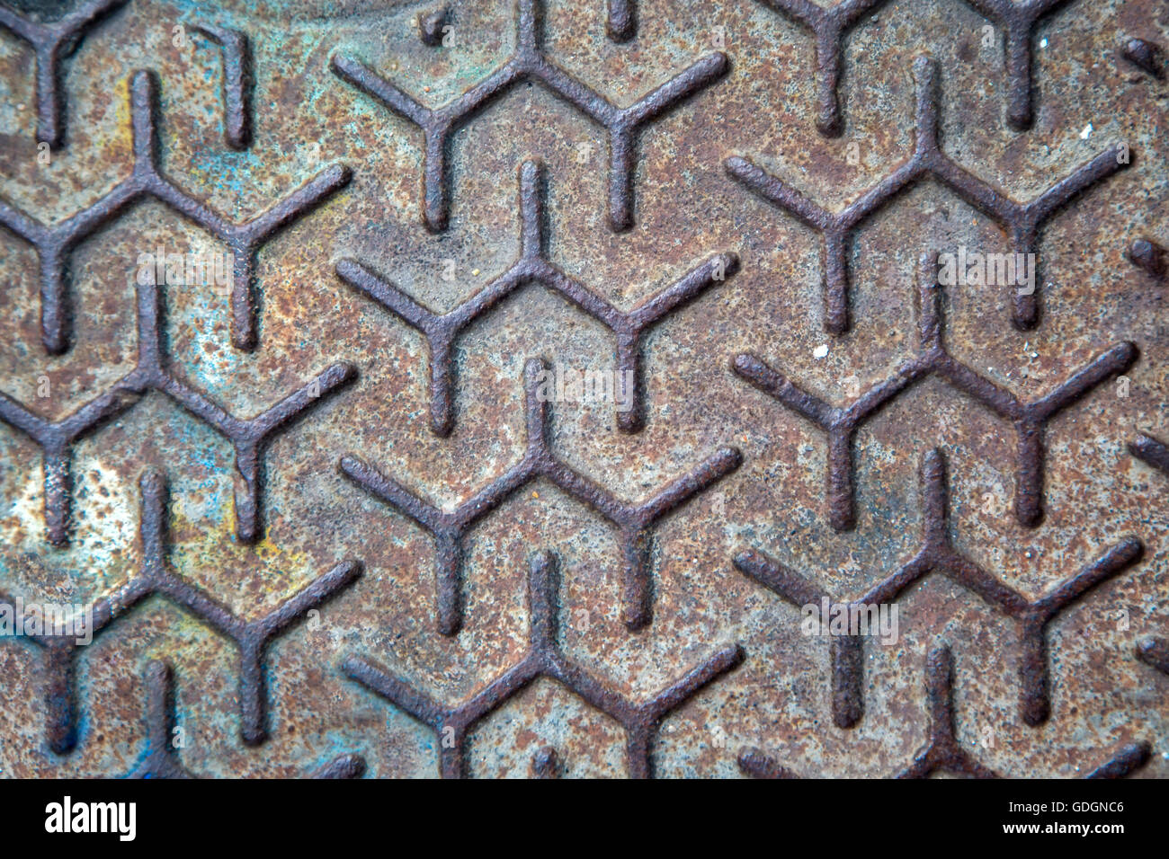 Texture of the metal manhole cover of street sewage shaft Stock Photo ...