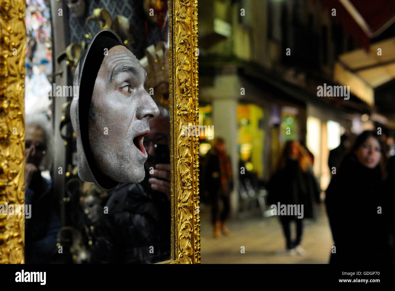Silver painted man in golden frame during Carnival of Venice Stock ...