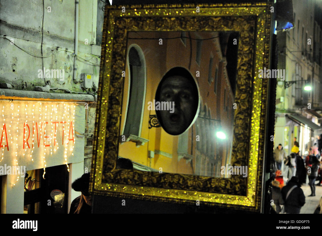 Silver painted man in golden frame during Carnival of Venice Stock ...