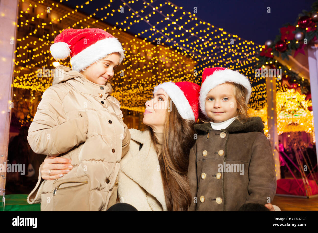 Happy family with two little daughters at street Stock Photo - Alamy