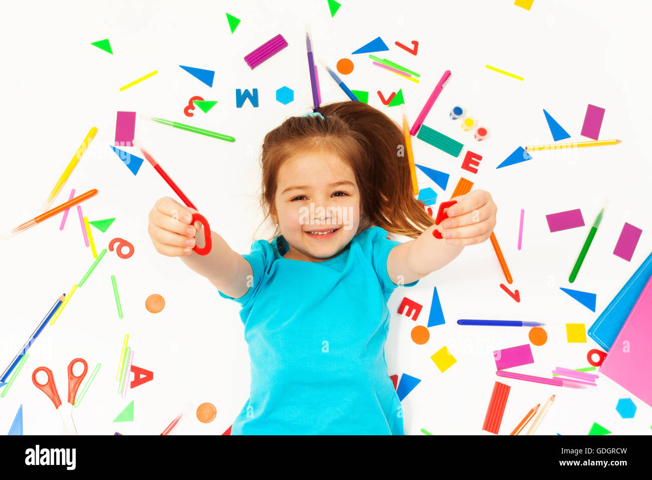 Little smiling girl learning mathematics Stock Photo - Alamy