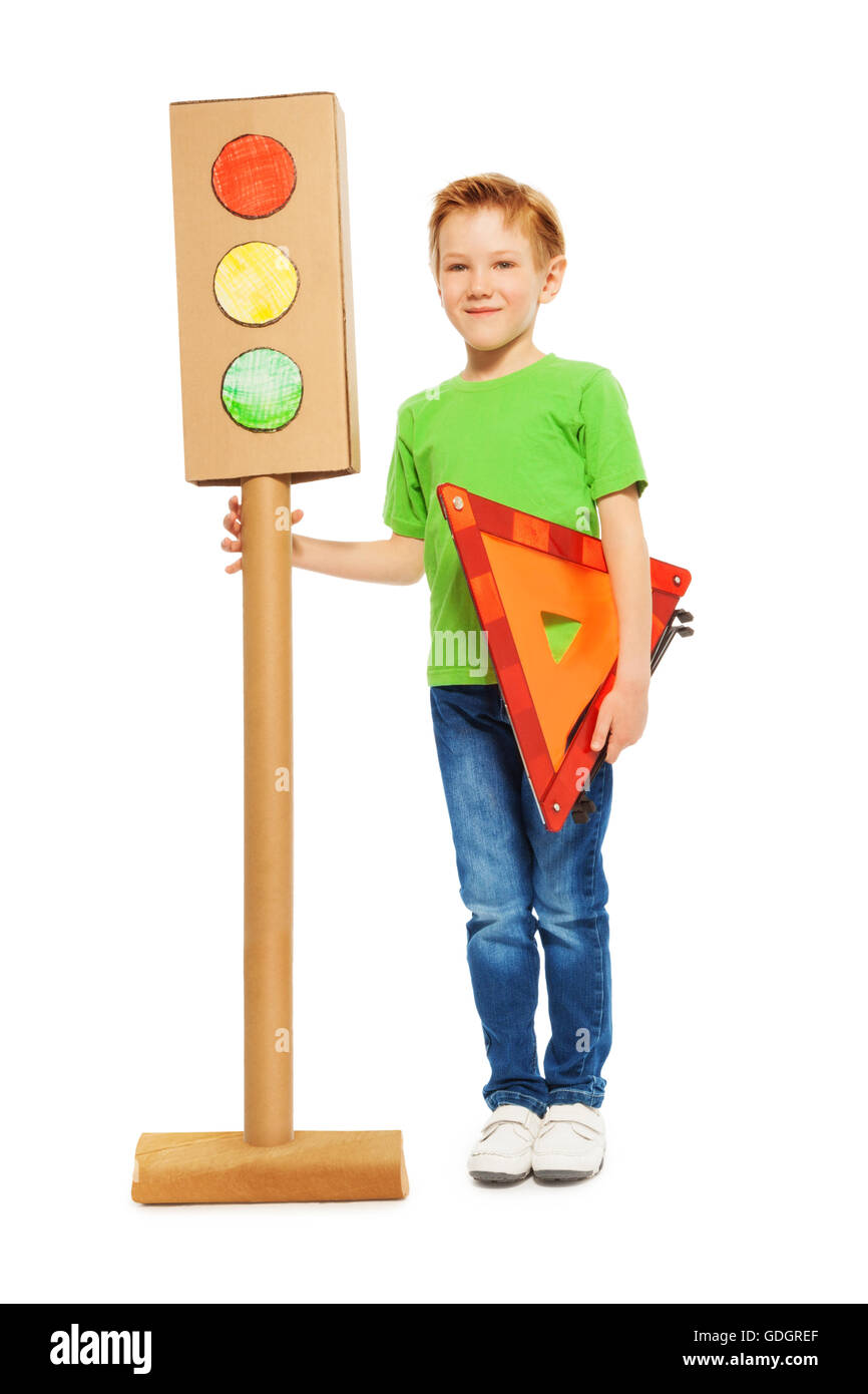 Boy with traffic light model and warning triangle Stock Photo - Alamy
