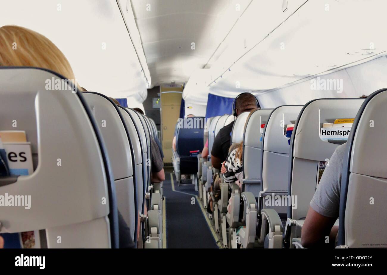Inside a packed airplane cabin Stock Photo - Alamy