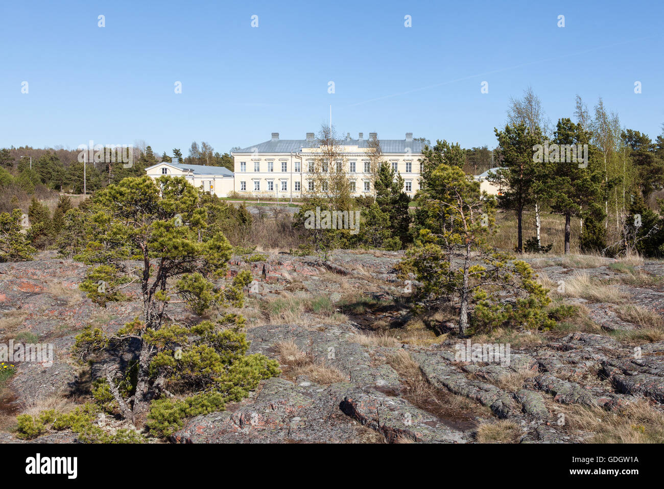 Yellow building beyond some small trees. Landmark, Post Museum built ...