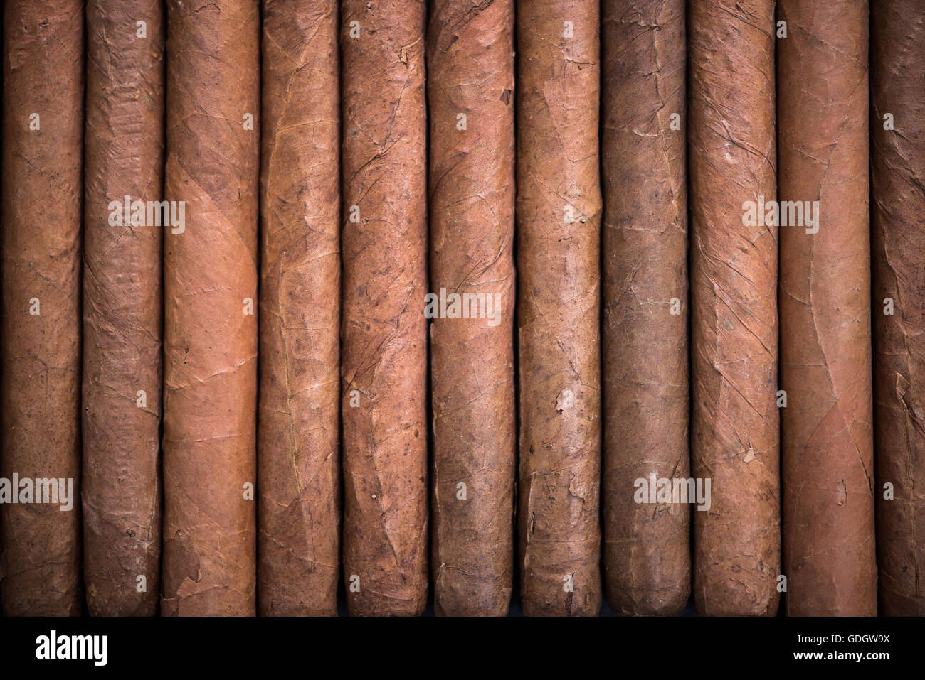 handrolled luxury cigars, full background Stock Photo - Alamy