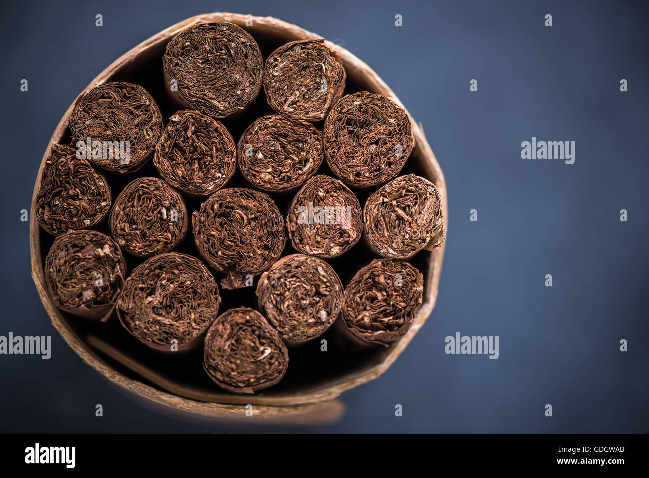 bunch of cigars, package on dark slate Stock Photo - Alamy