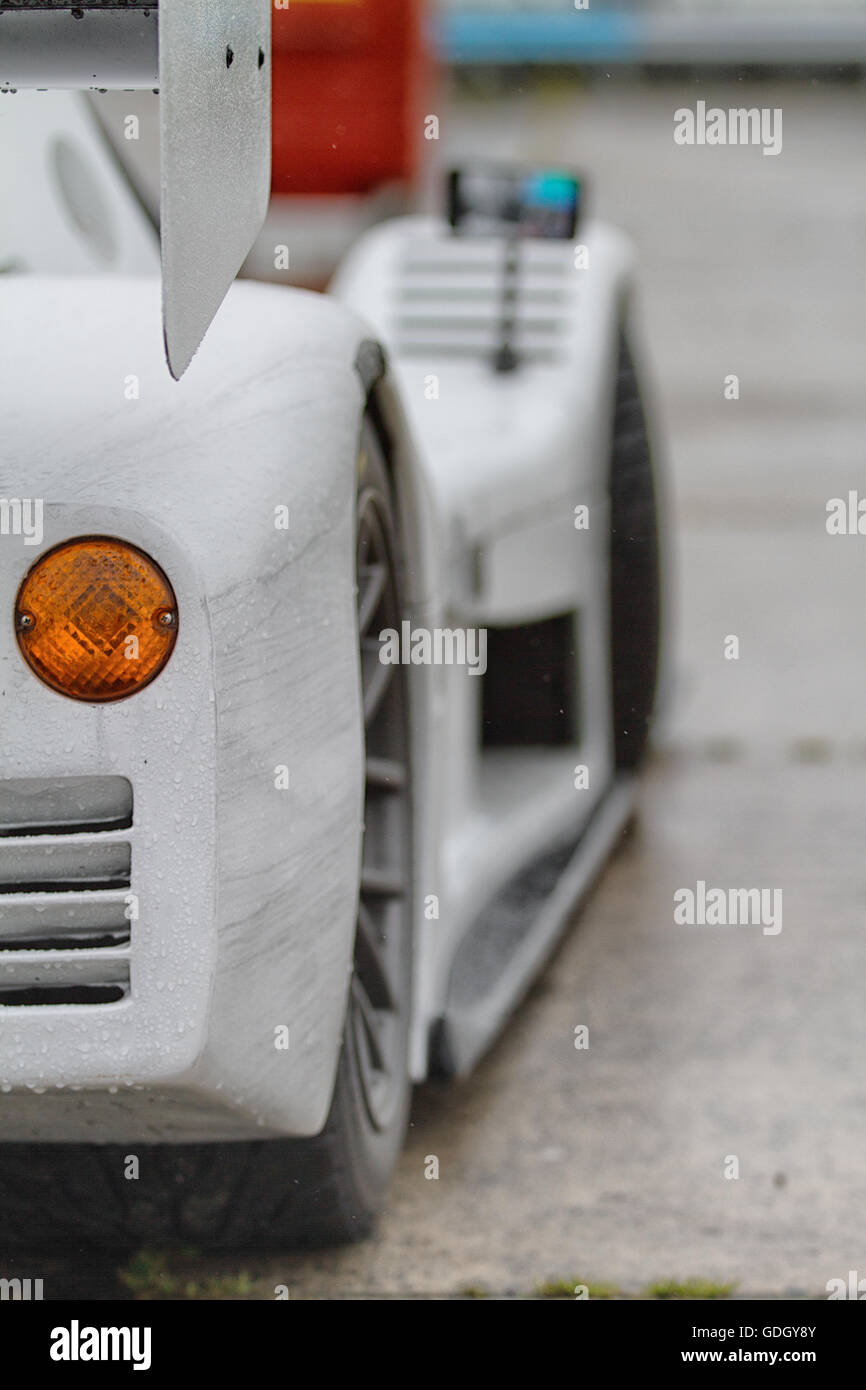 Vertical shot of a section of racing car taken from the rear or behind ...