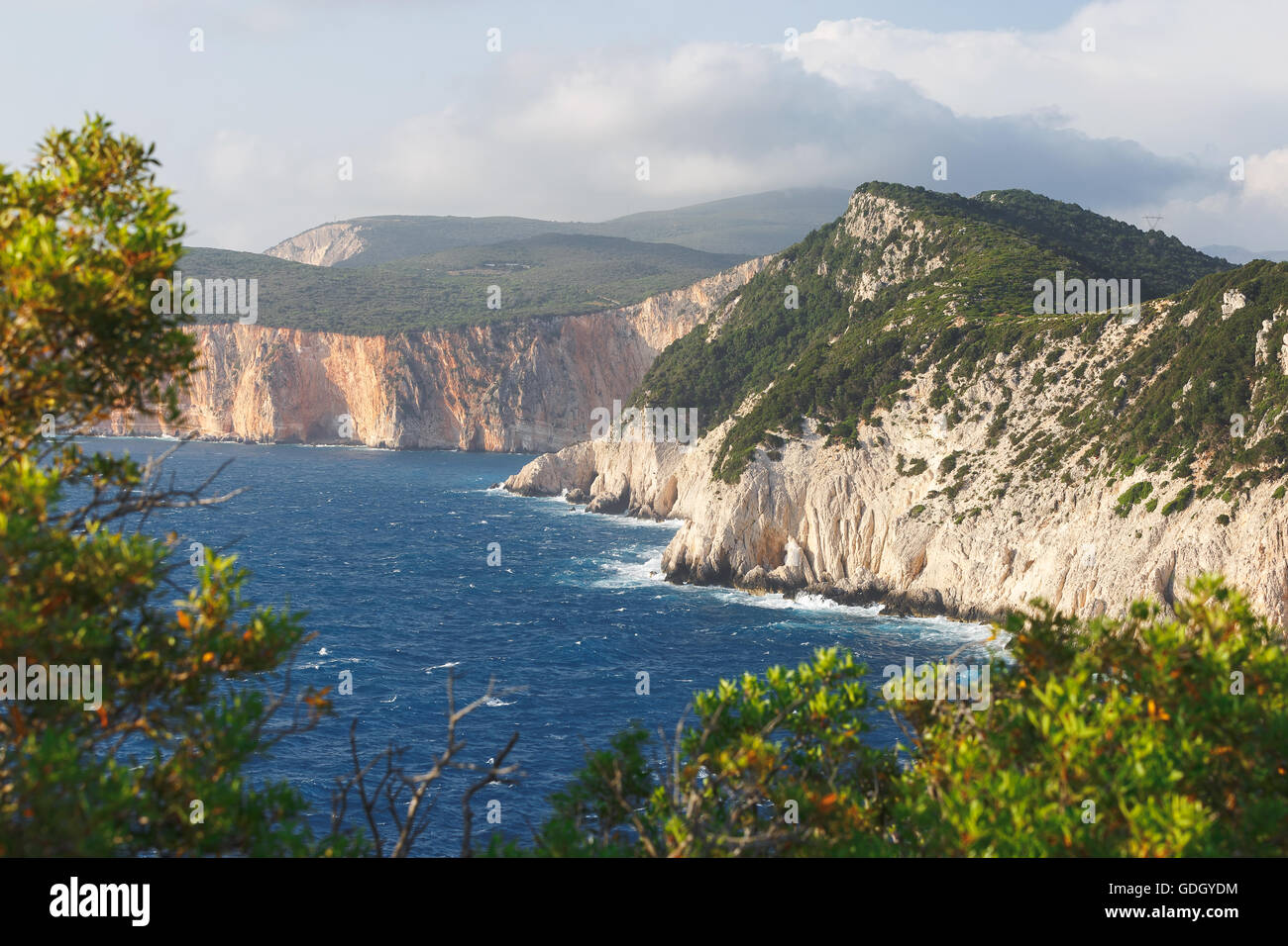 Lefkada island, west coast cliffs and blue sea water waving at coast ...