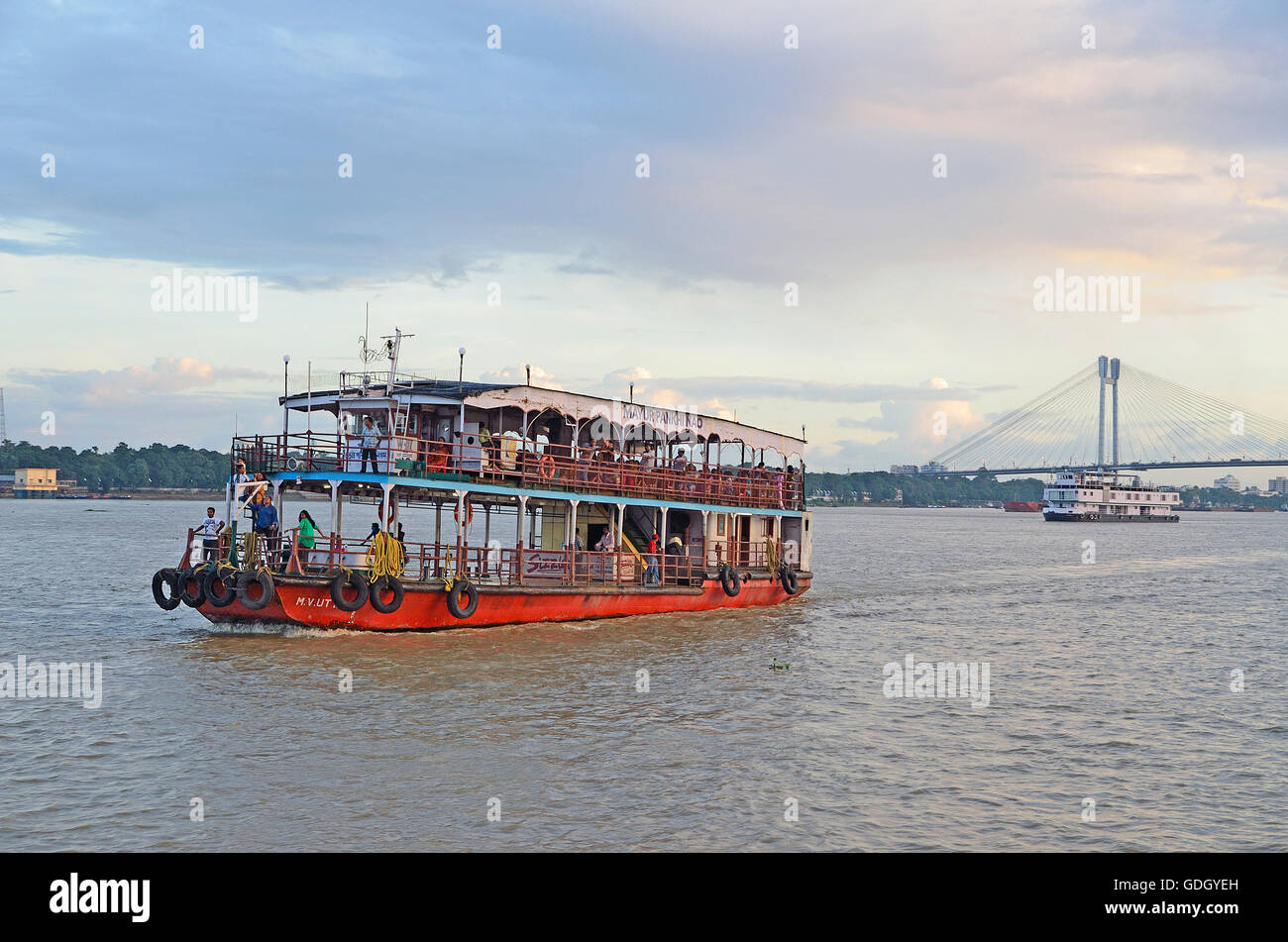 Passenger ferry service over Hooghly river with Second Hooghly Bridge ...