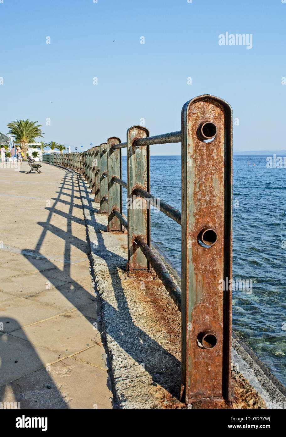 Corroded metal fence on the sea promenade Stock Photo - Alamy