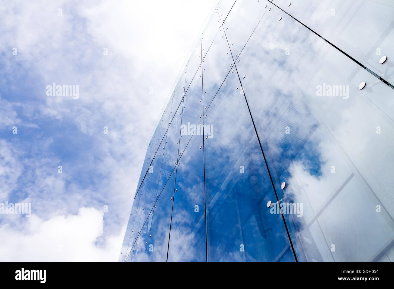 Glass wall with sky reflection Stock Photo - Alamy