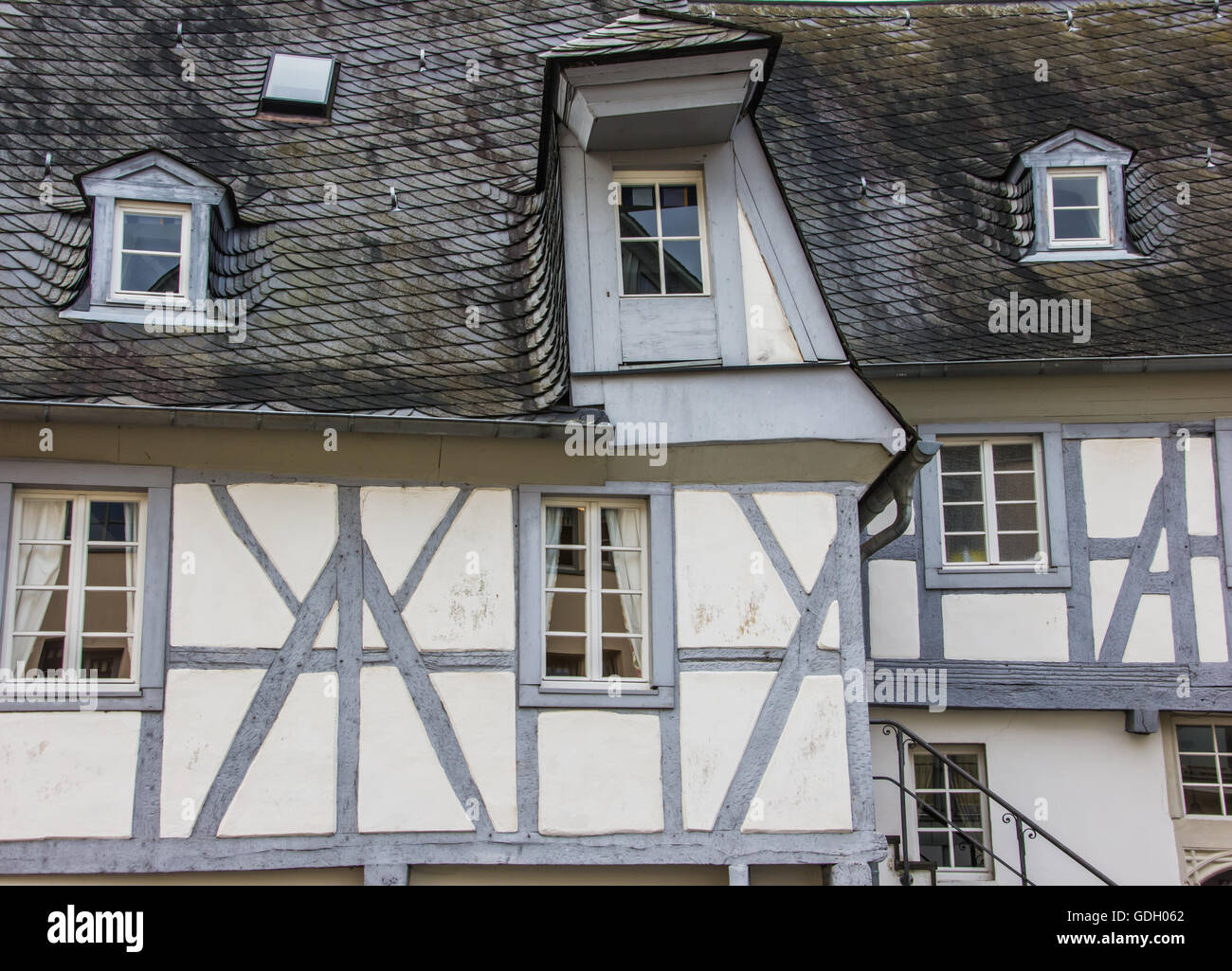 Detail of a grey and white haf-timbered house Stock Photo - Alamy