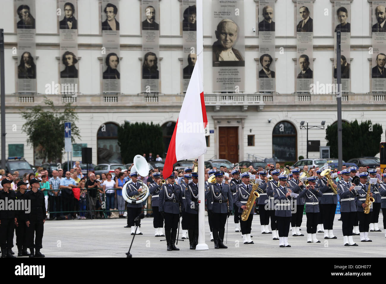 Warsaw, Poland. 16th July, 2016. The Polish flag is raised during ...