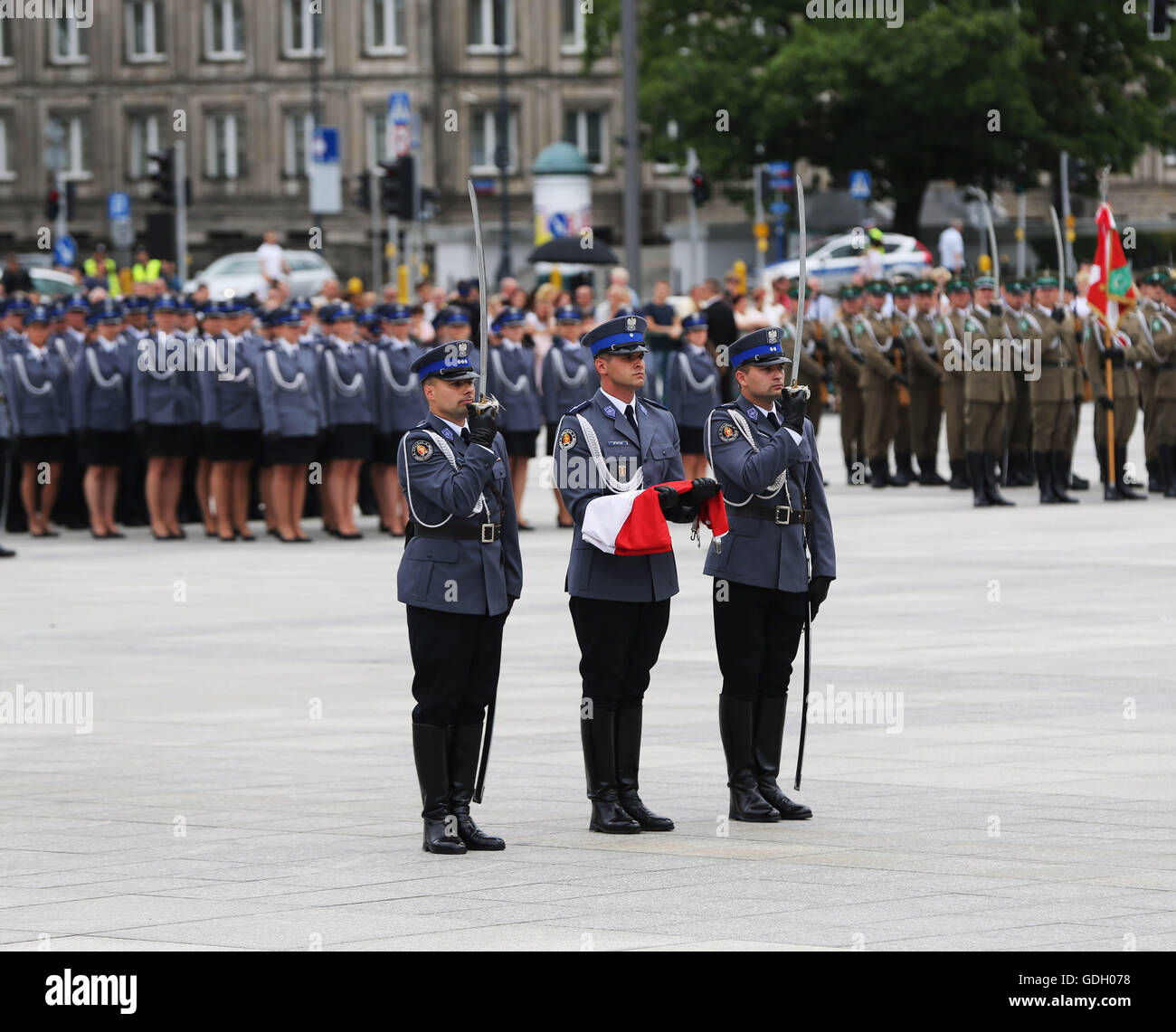 Warsaw, Poland. 16th July, 2016. Polish police officers carry the ...