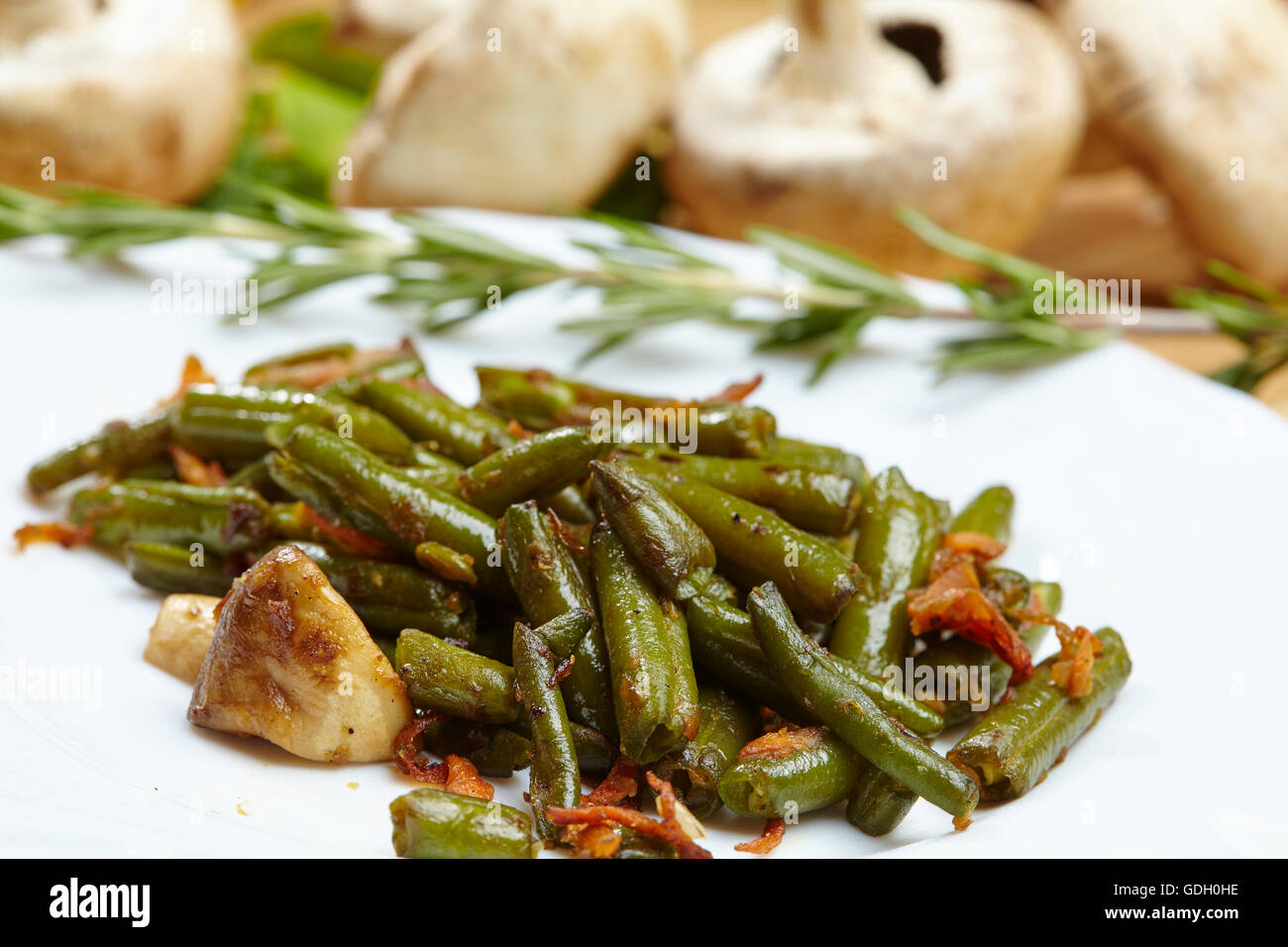 healthy vegan dish braised green beans Stock Photo - Alamy