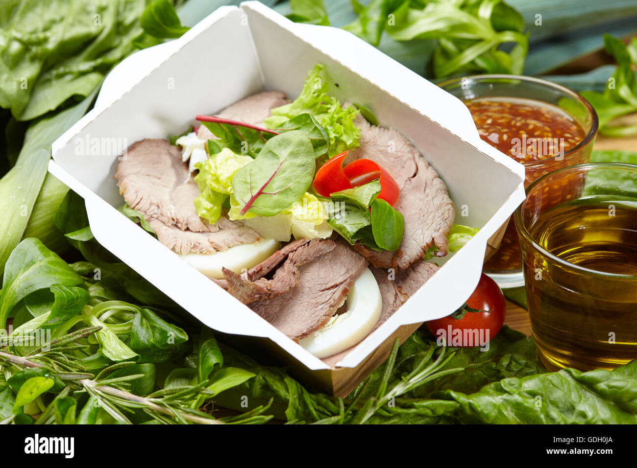 dietary delicious dish cooked meat with vegetables and greens Stock ...