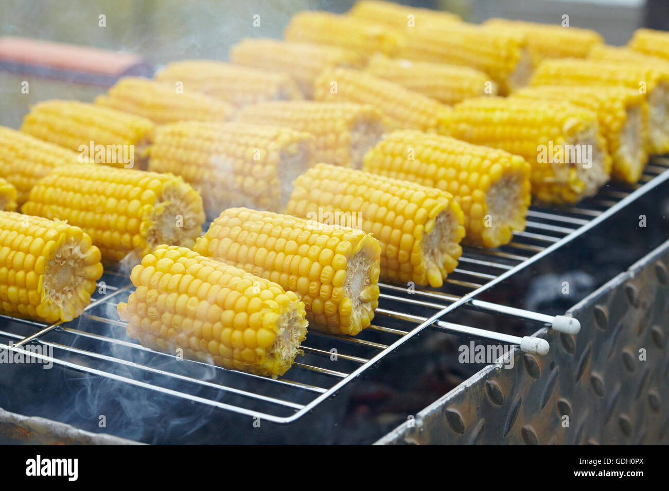 Corn on the grill Stock Photo - Alamy