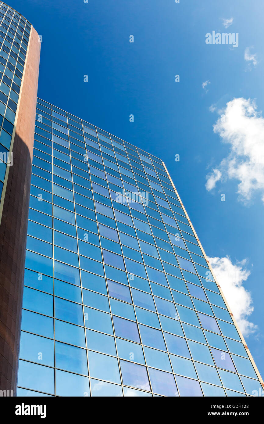 Blue glass wall of office buildings on sky background Stock Photo - Alamy