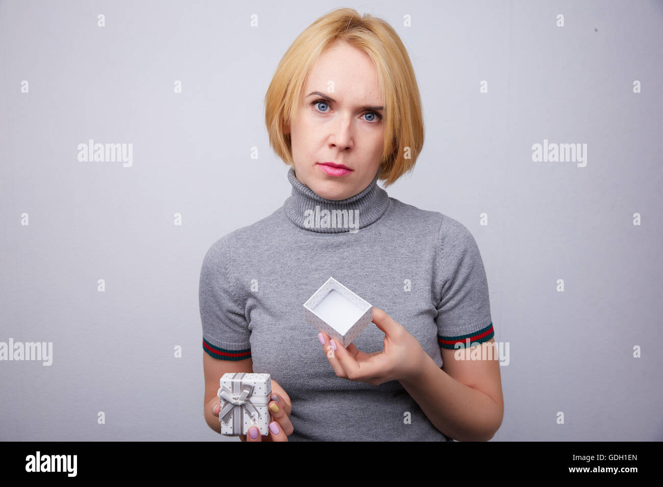 woman disappointed gift Stock Photo - Alamy