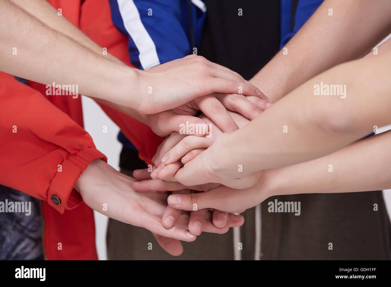 Hands close-up all together Stock Photo - Alamy