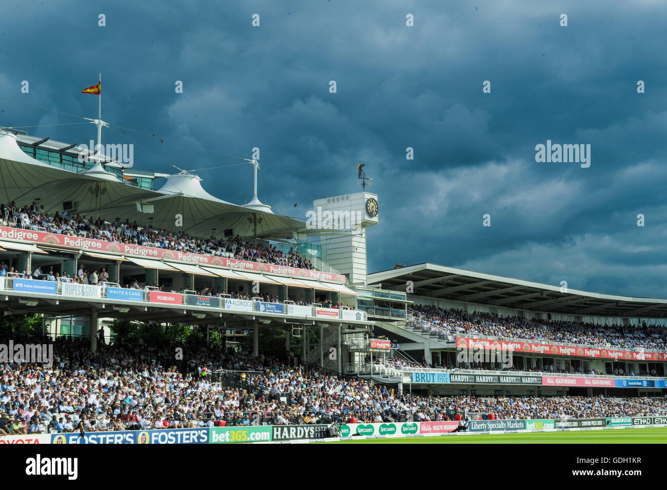 Dark skies are seen behind the Father Time weather vane during day ...
