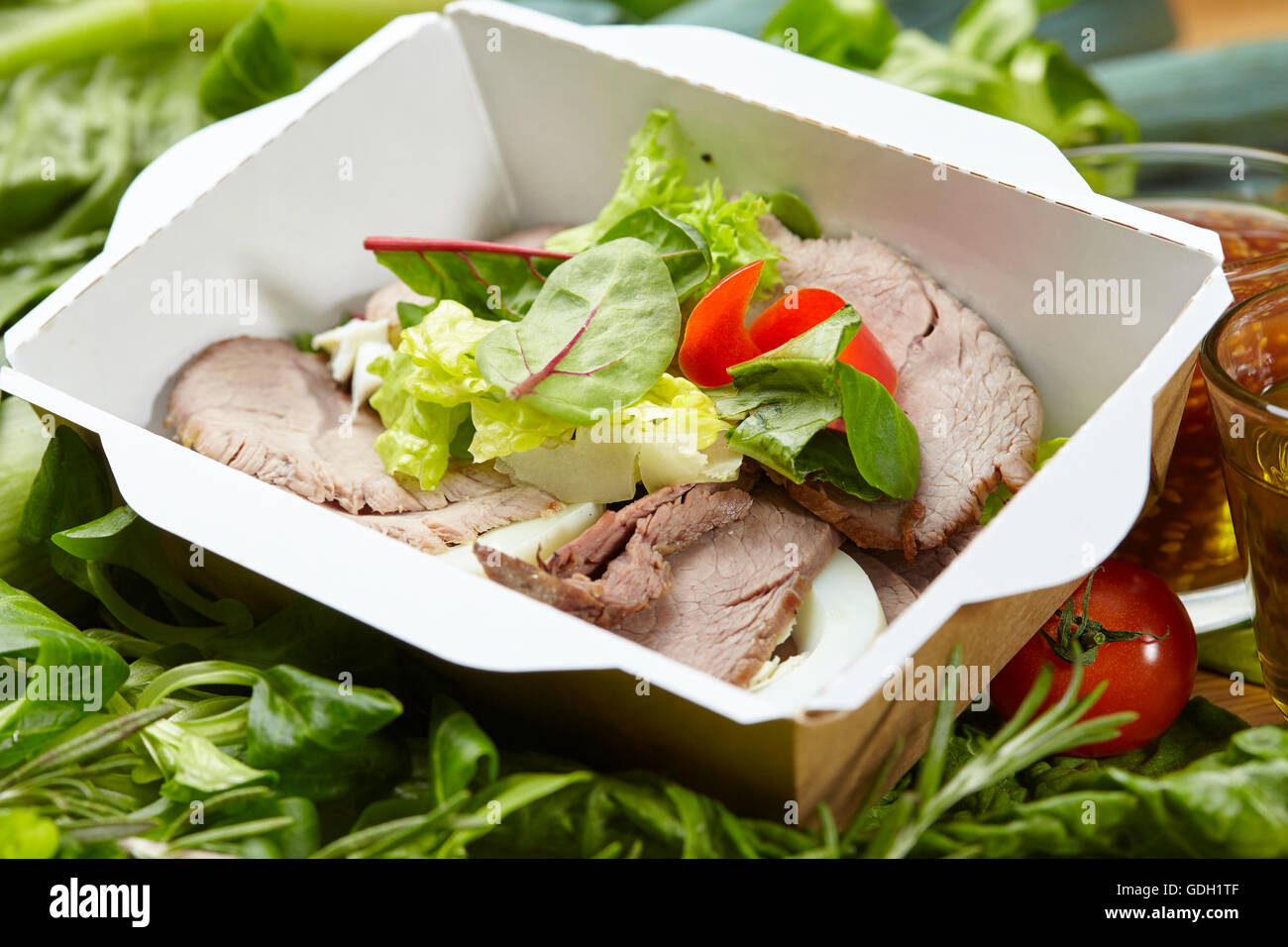 dietary delicious dish cooked meat with vegetables and greens Stock ...