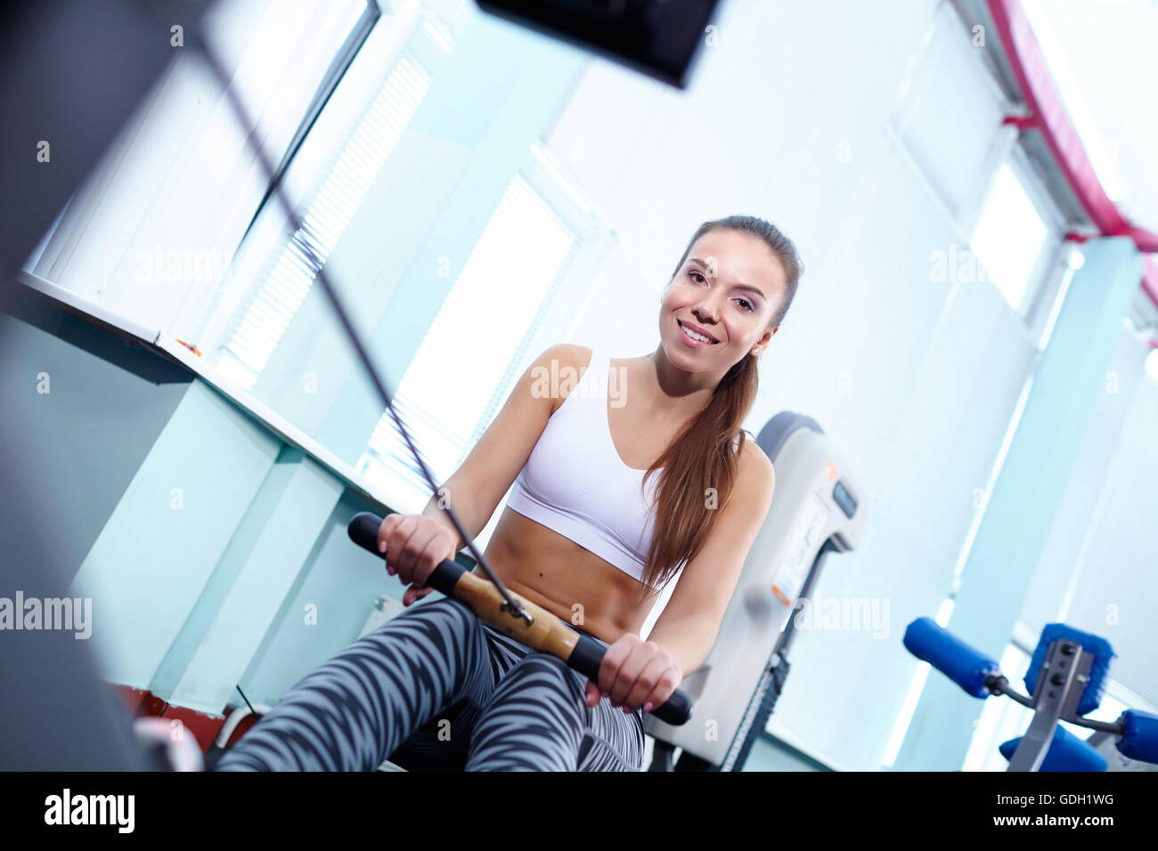 pretty girl training at the gym Stock Photo - Alamy