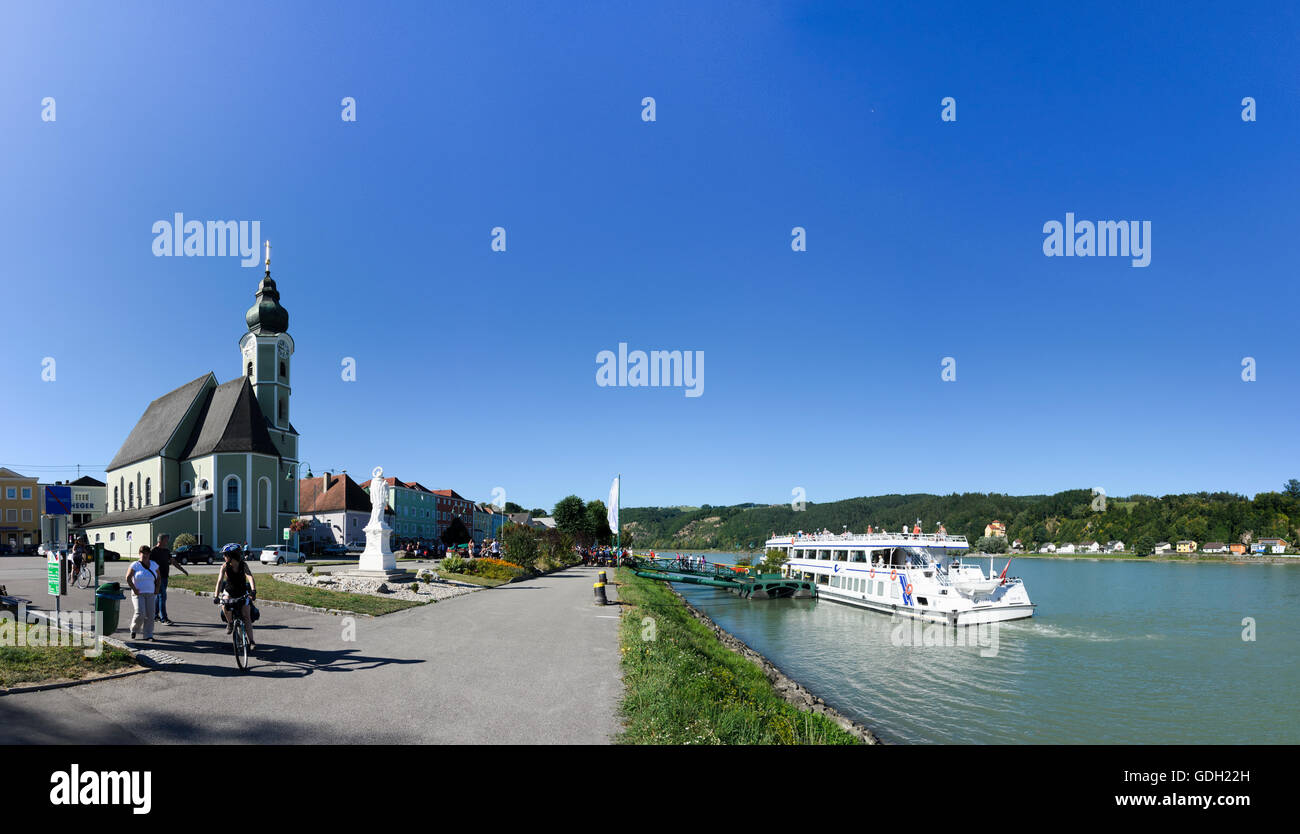 Aschach an der Donau: Old Town , church and passenger ship on the ...