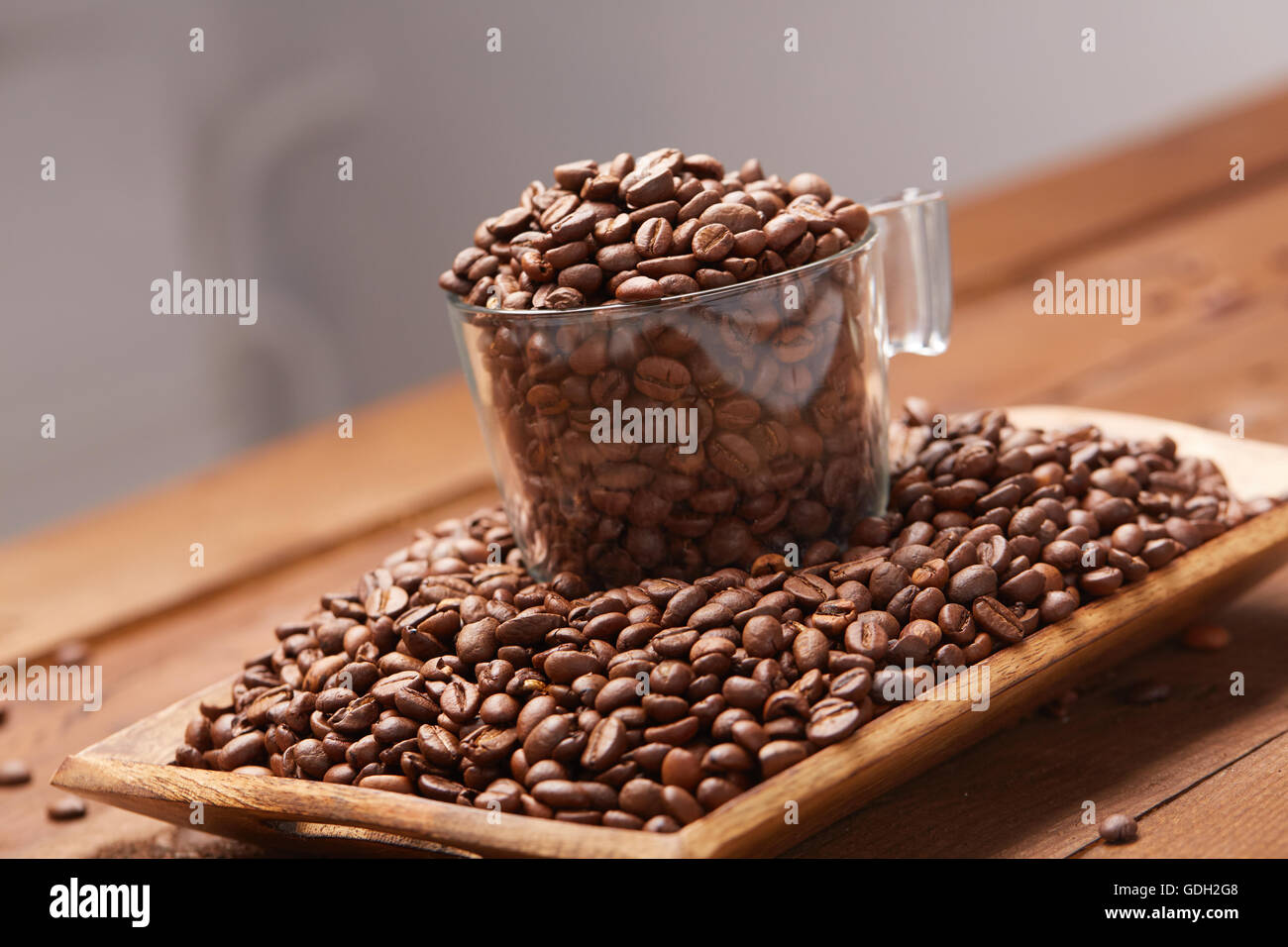 coffee beans in cup in the tray Stock Photo - Alamy