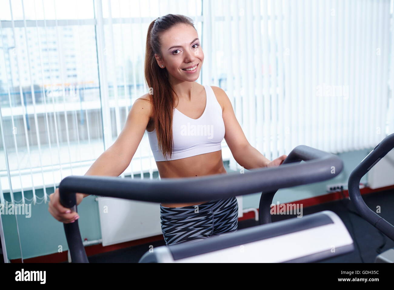 pretty girl training at the gym Stock Photo - Alamy