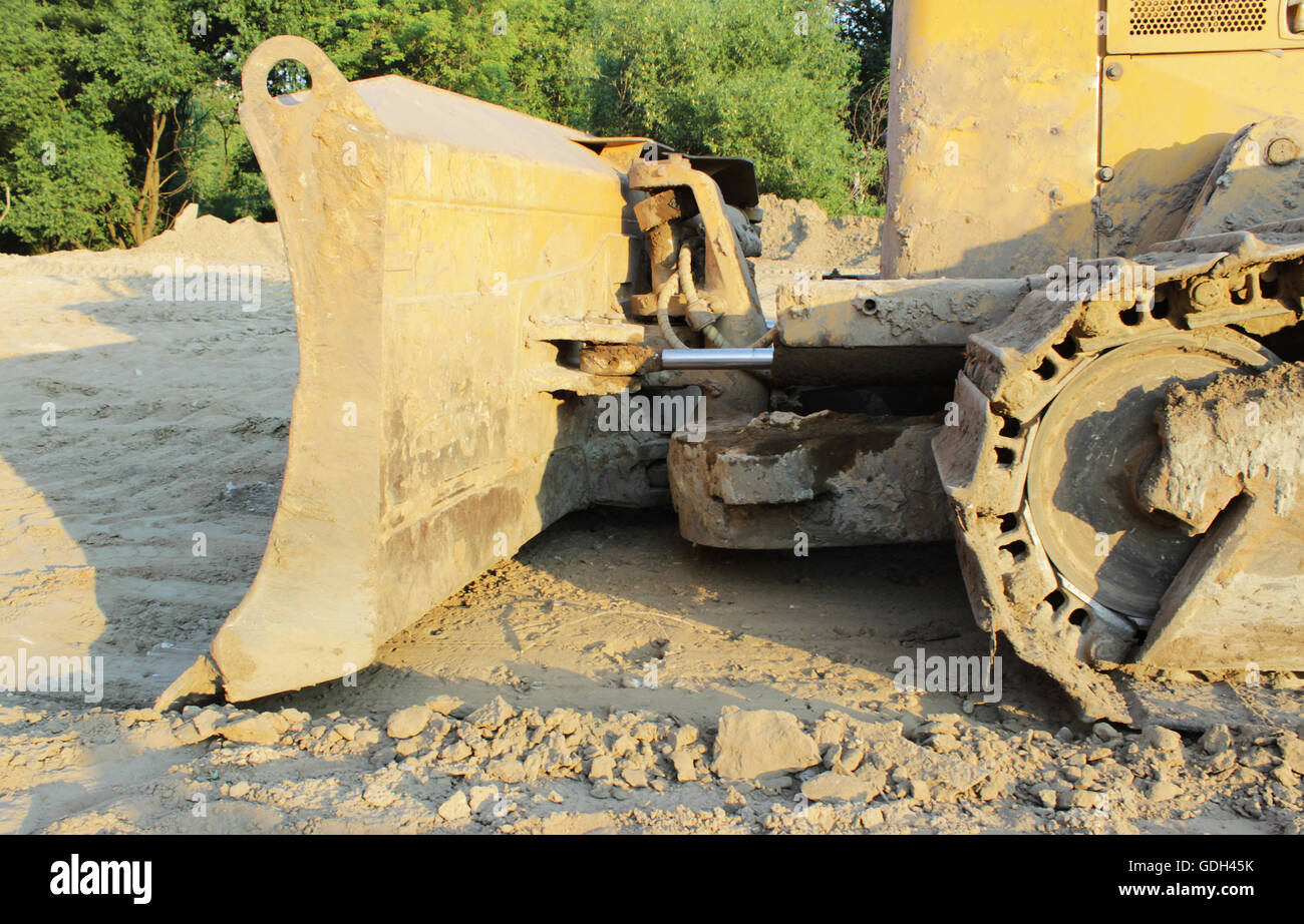 blade in the bulldozer and ground Stock Photo - Alamy