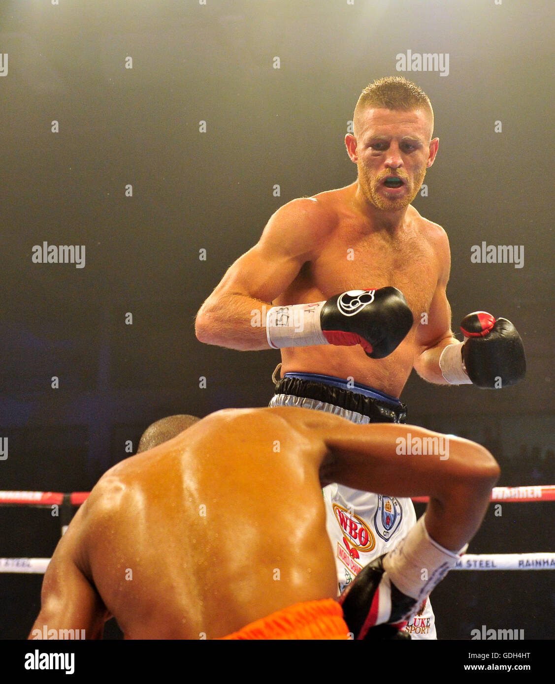 Terry Flanagan (back) in action against Mzonke Fana during their WBO ...