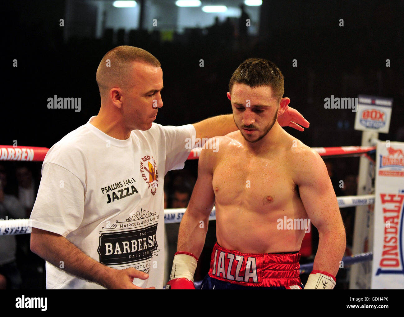 James Dickens is consoled by a member of his team after losing to ...