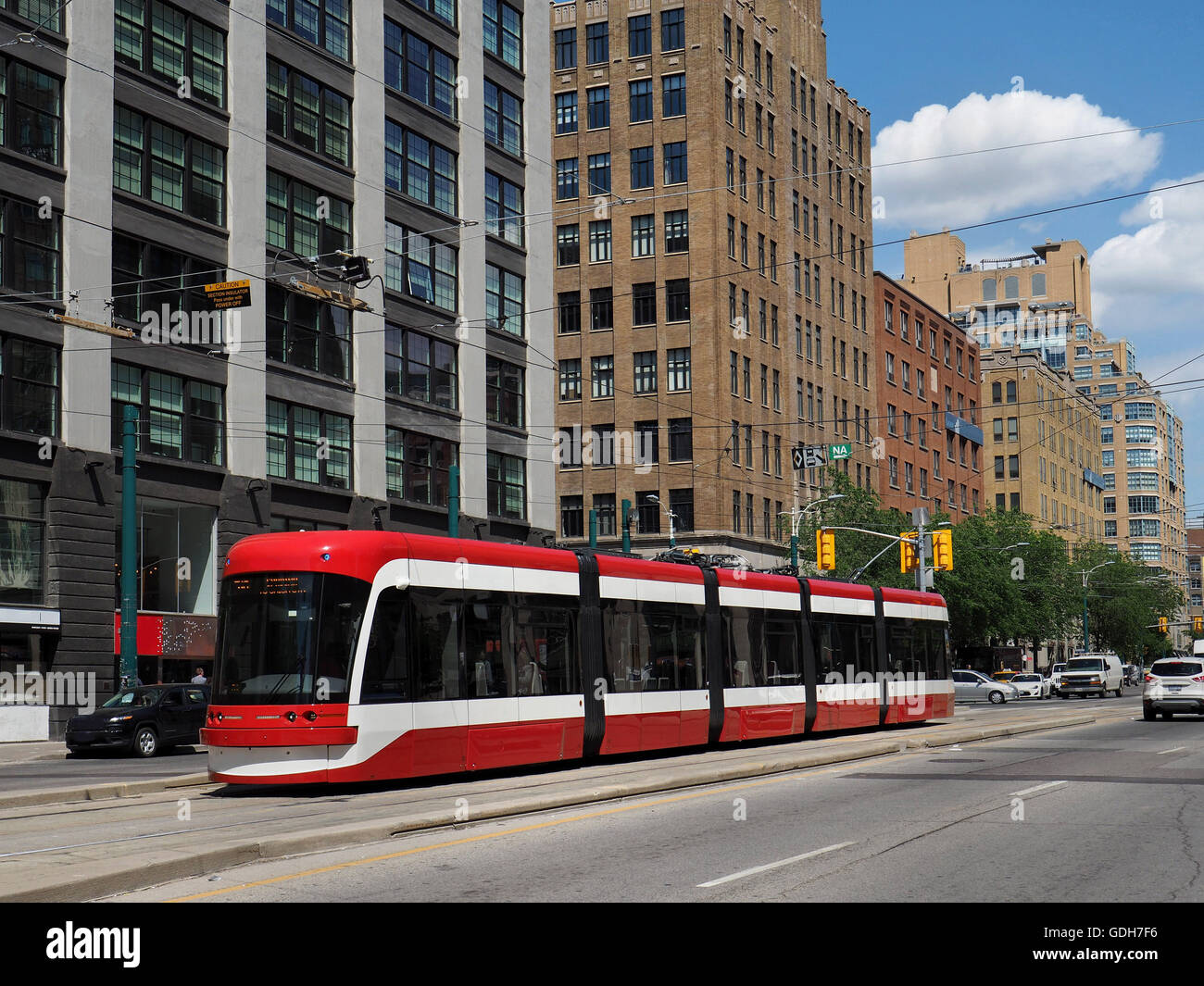 Toronto street scene with light rapid transit train Stock Photo - Alamy