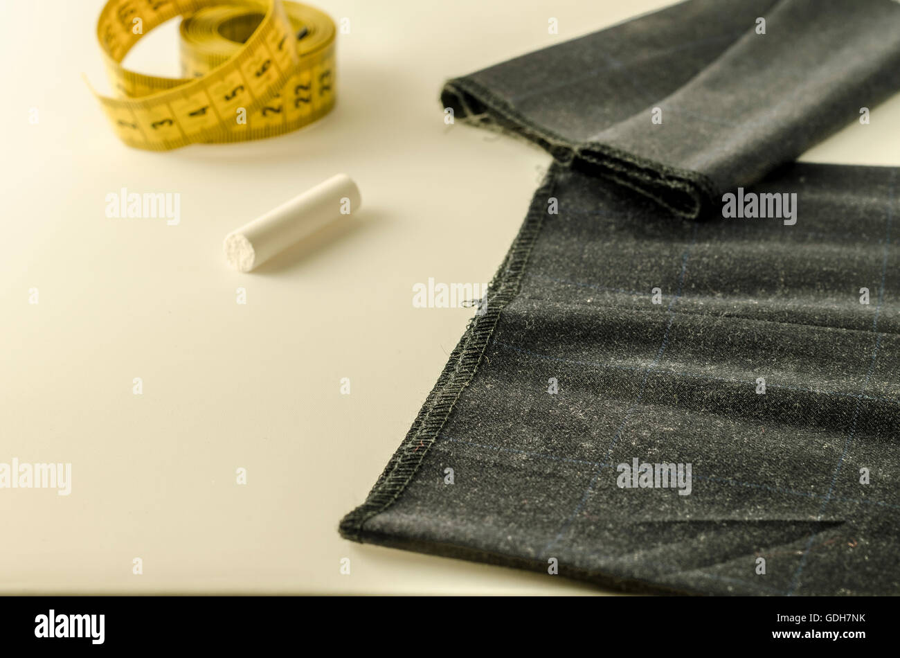 still life with a tape measure a chalk and tissue Stock Photo - Alamy