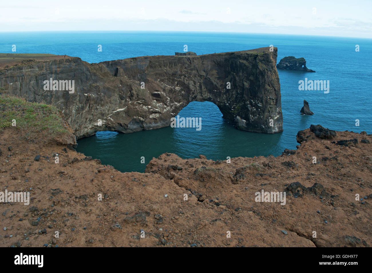 Iceland: the rock arch of Dyrholaey, located on the promontory of ...