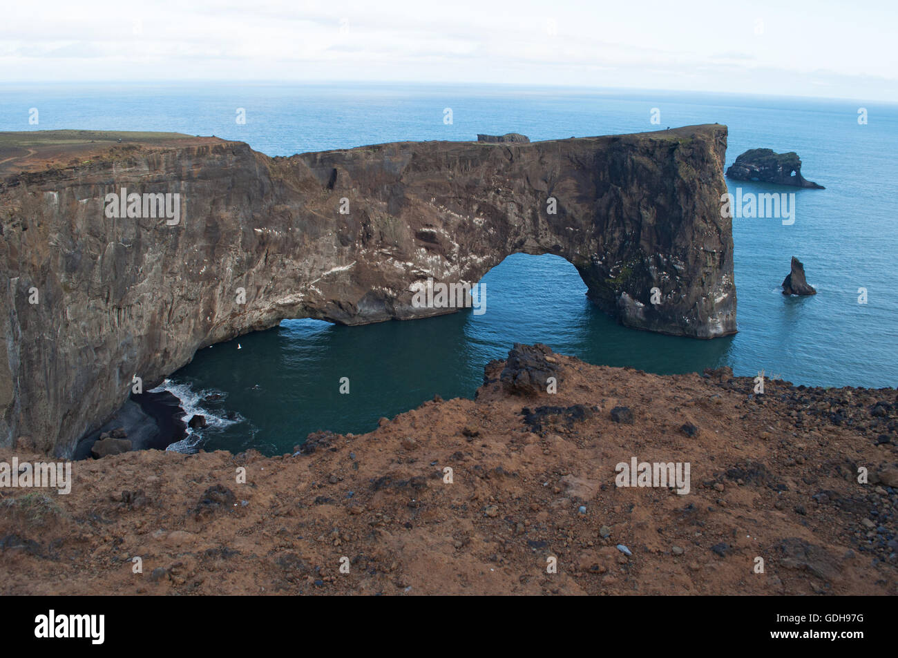 Iceland: the rock arch of Dyrholaey, located on the promontory of ...