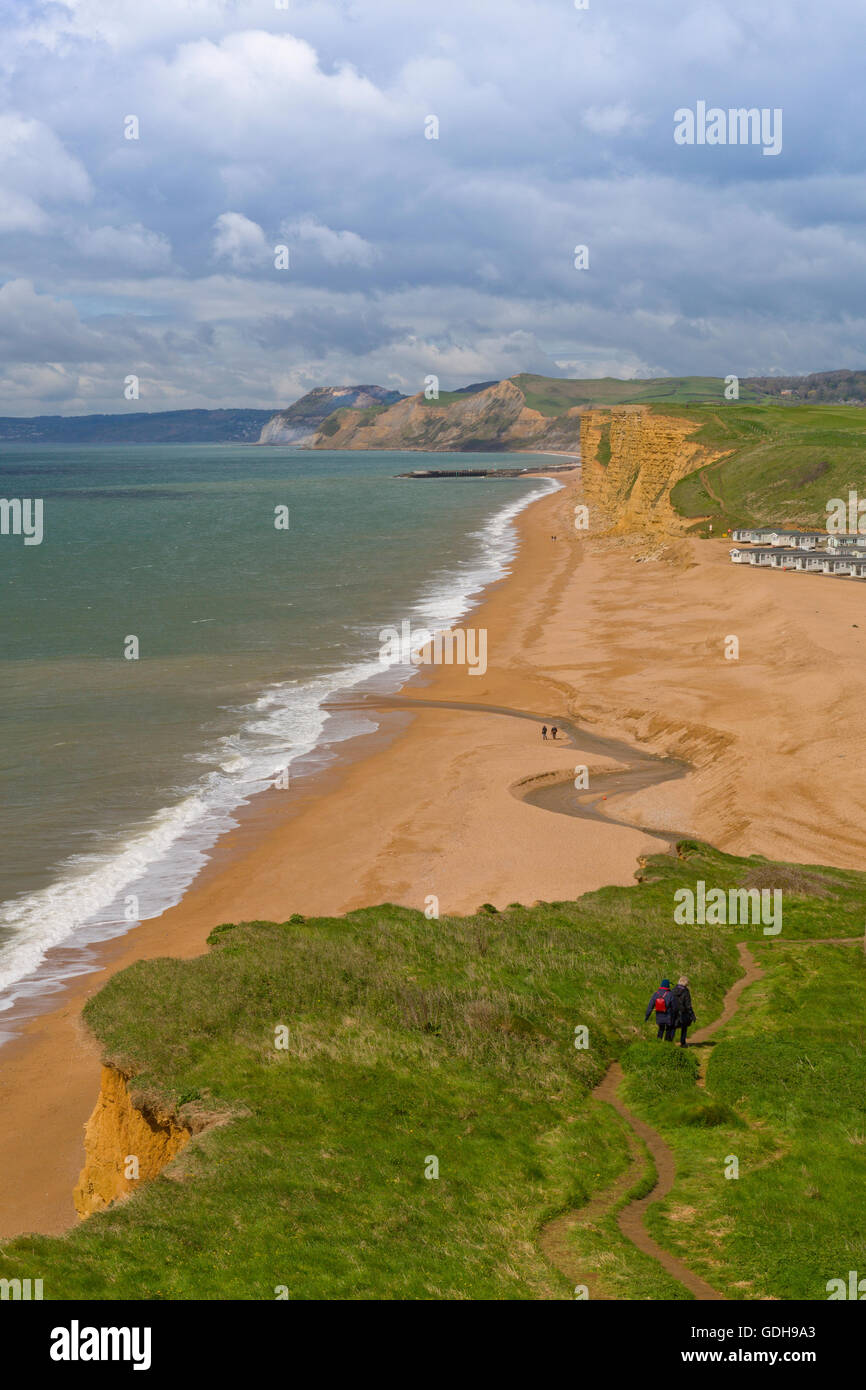 The River Bride enters the English Channel across the beach near Burton ...