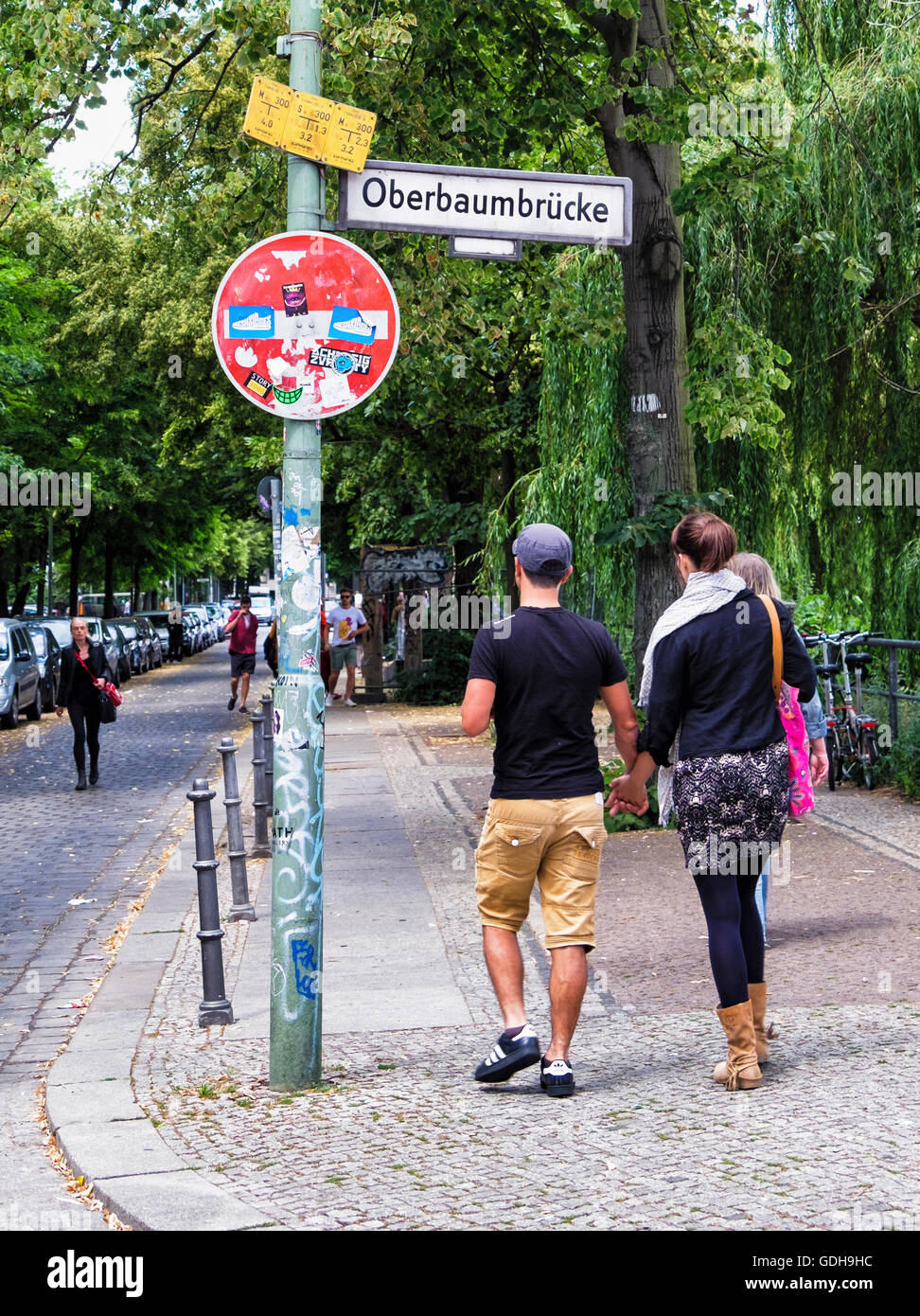 Berlin Oberbaumbrucke street sign & sticker covered no entry sign ...