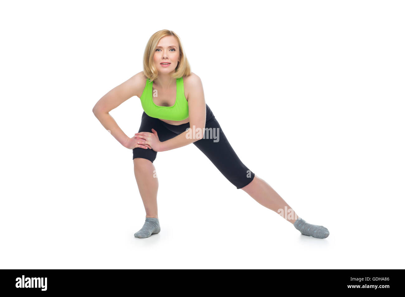 Beautiful middle aged woman doing sport exercise Stock Photo - Alamy