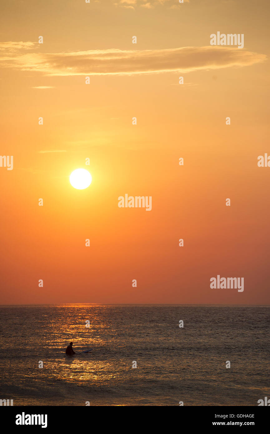 surfer at sunset Stock Photo - Alamy
