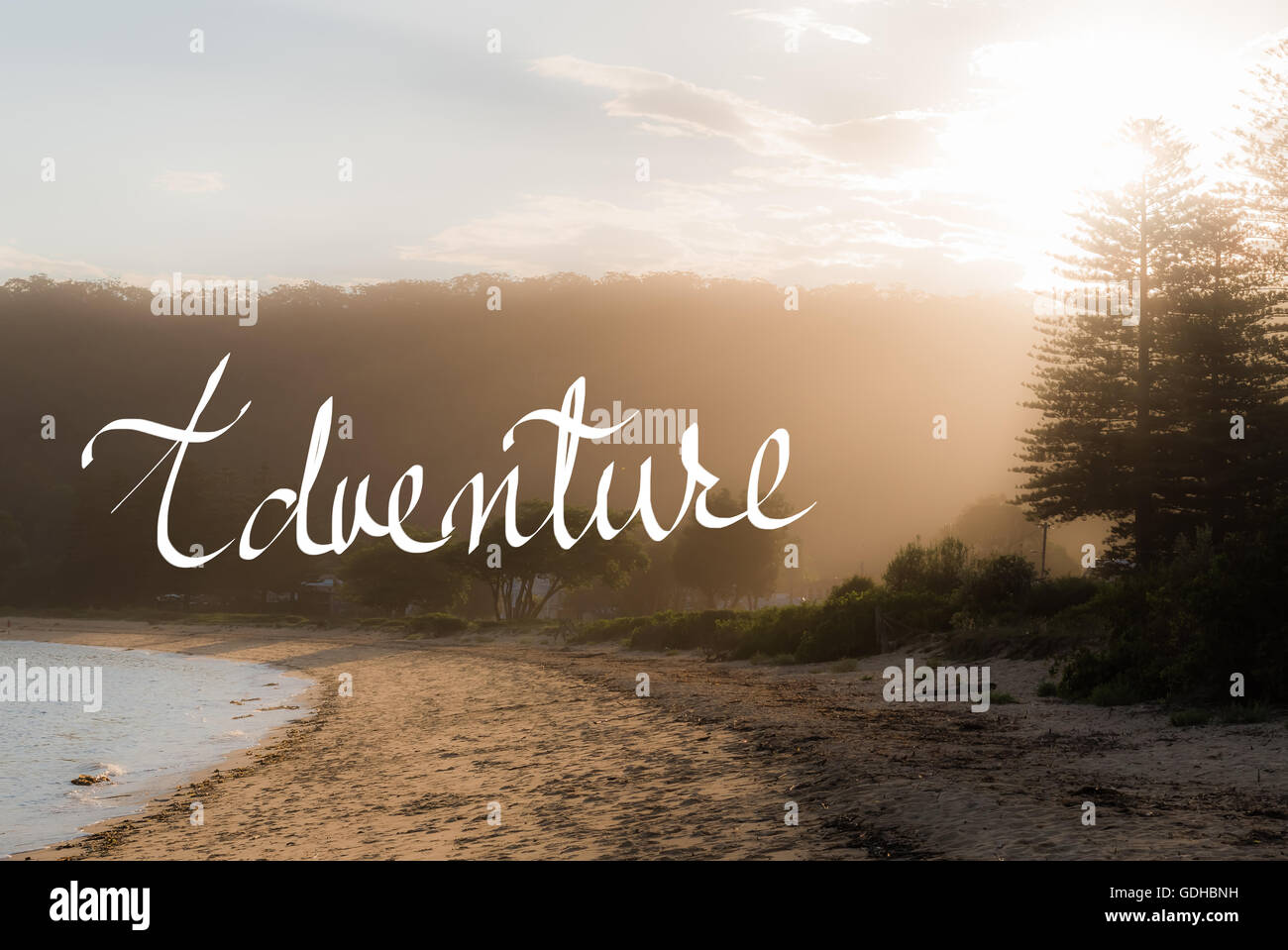 Adventure message. Handwritten motivational text over sunset calm sunny ...
