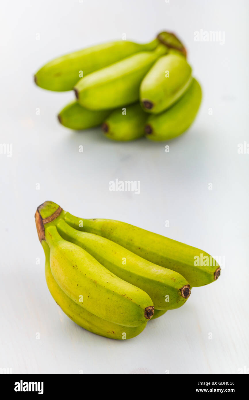 Bananas on timber board hi-res stock photography and images - Alamy